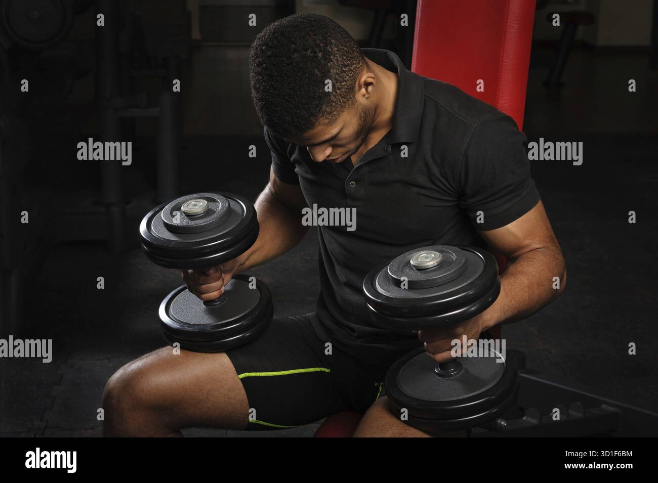 Handsome young african descent Mixed-race man sitting and resting on ...