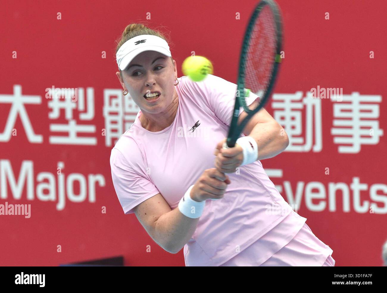 Hong Kong, China. 28th Oct, 2025. Talia Gibson hits a return during the ...