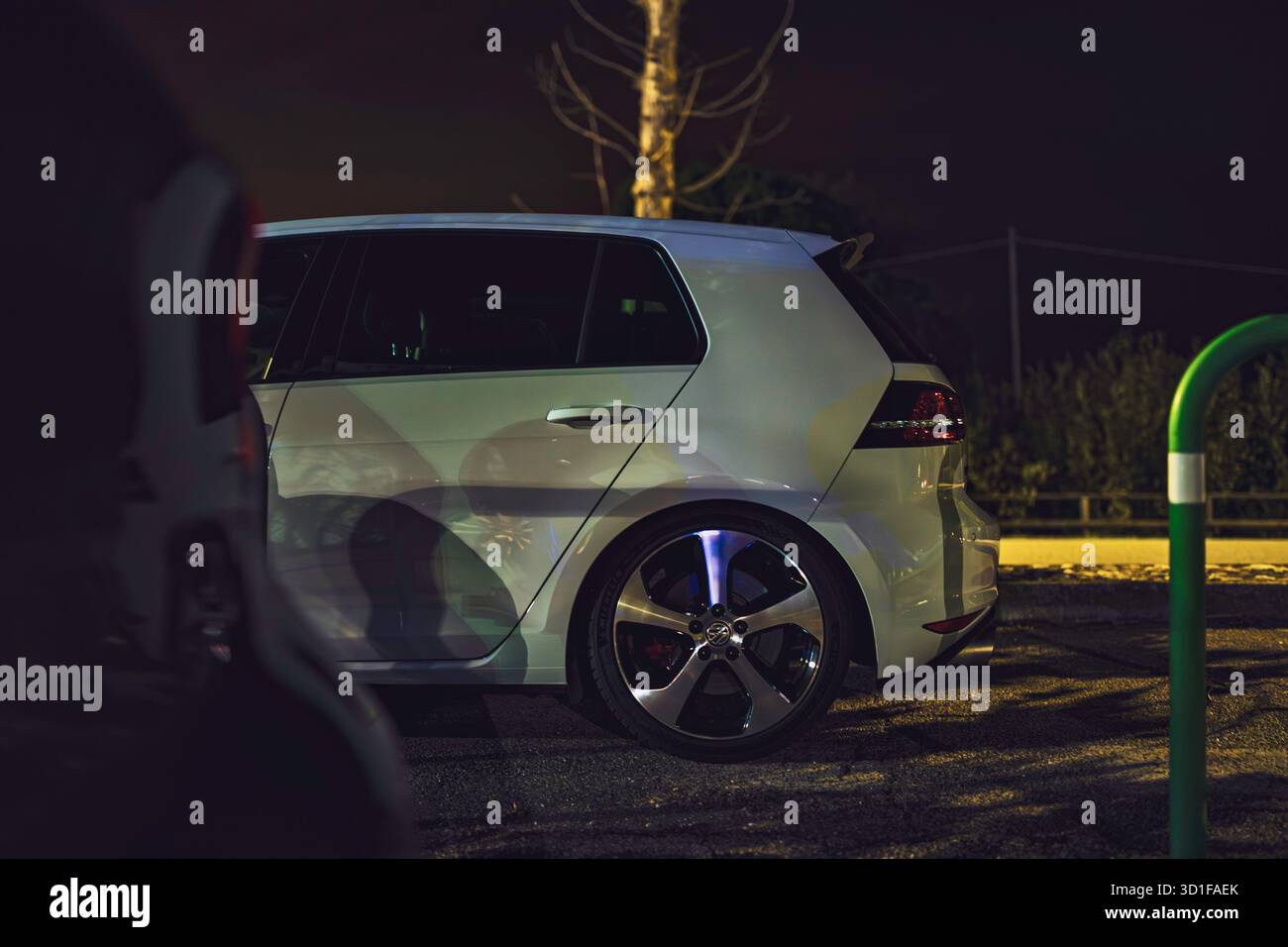 Este, italy 28 october 2025: volkswagen golf gti parked on urban street ...