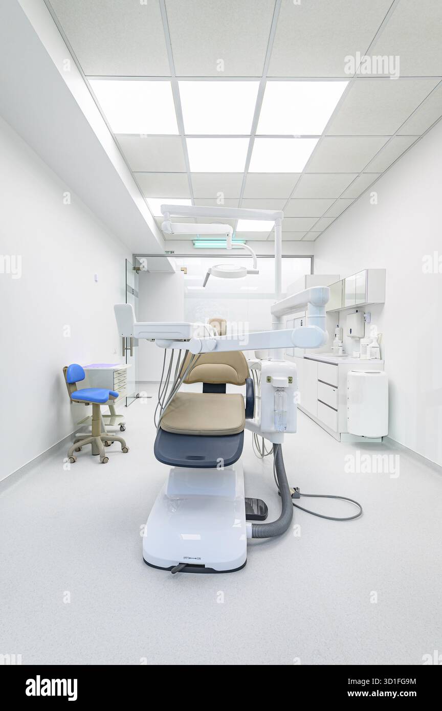 Interior of white modern dentistry medical room with special equipment ...