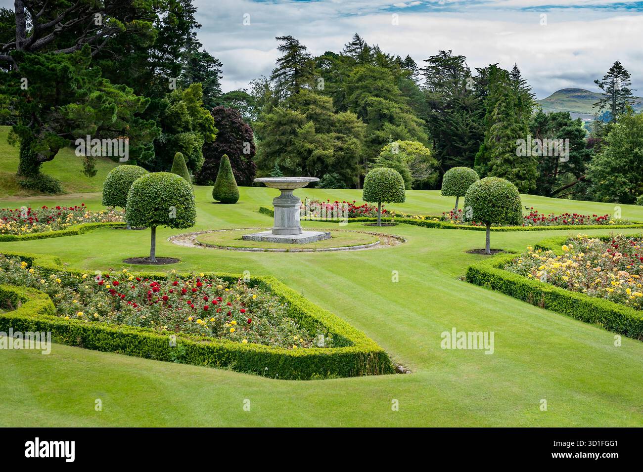 Scenic summertime view of an attractive English style landscape garden ...