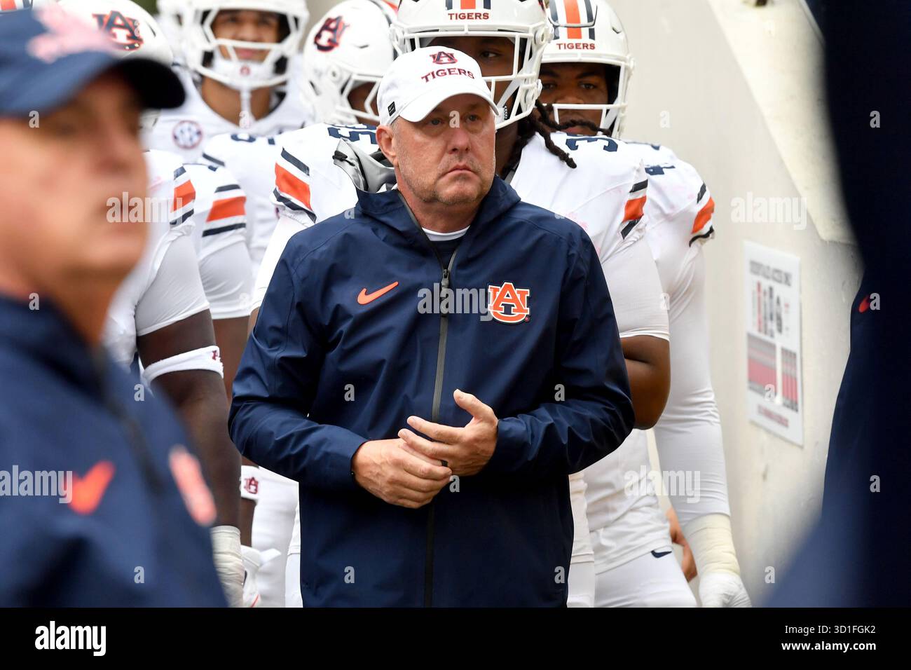 Auburn coach Hugh Freeze gets ready to take the field to play Arkansas ...