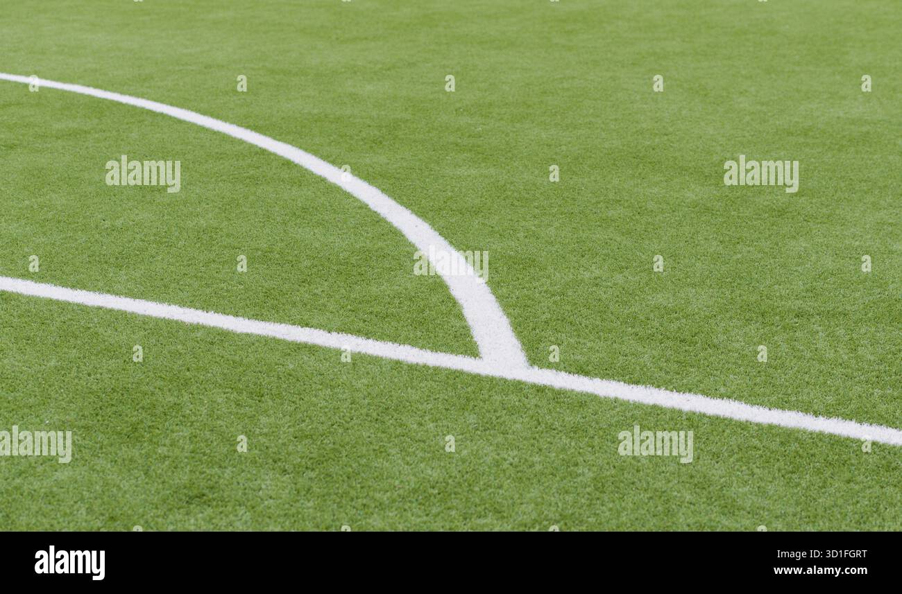 Artificial turf as a background Close up on soccer field with ...