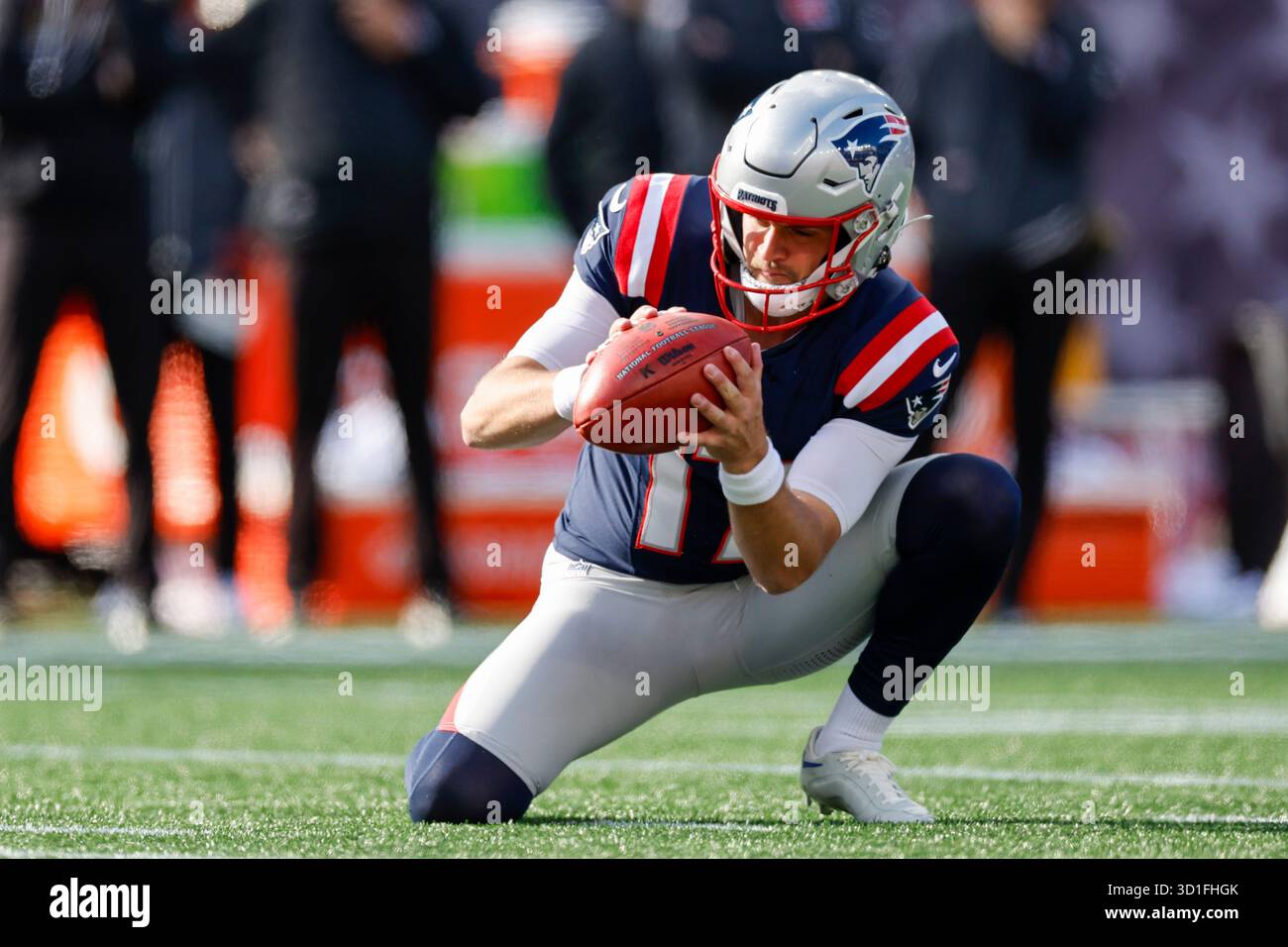 New England Patriots punter Bryce Baringer (17) takes the snap during ...
