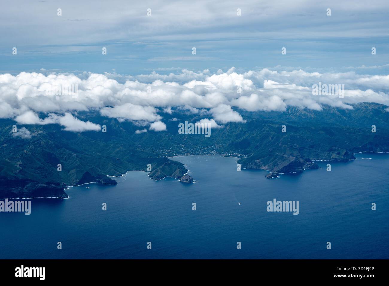 Nuku Hiva, the largest island in the Marquesas, features rugged green ...