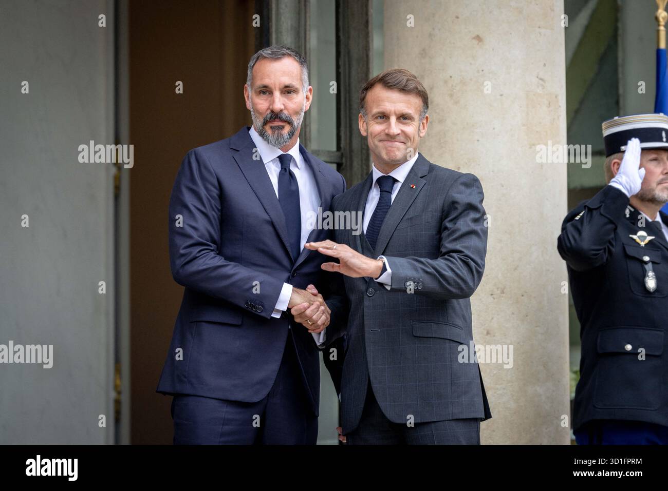 France's President Emmanuel Macron (R) welcomes Prince Rahim al ...