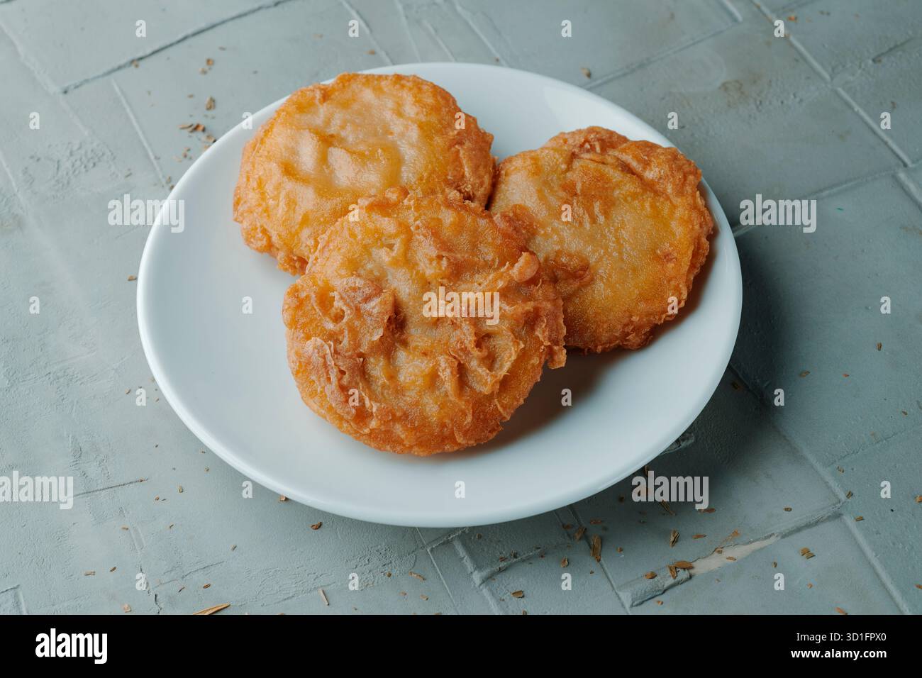 traditional Spanish tortas de camaron, crispy shrimp fritters made with ...