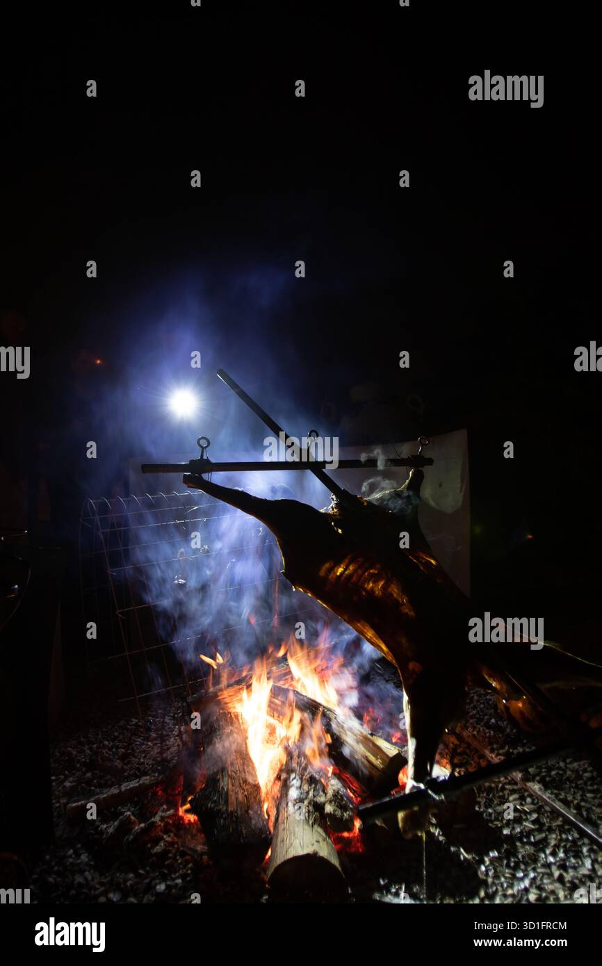 rustic lamb barbecue bbq over open fire in Chile, South America. Asado ...