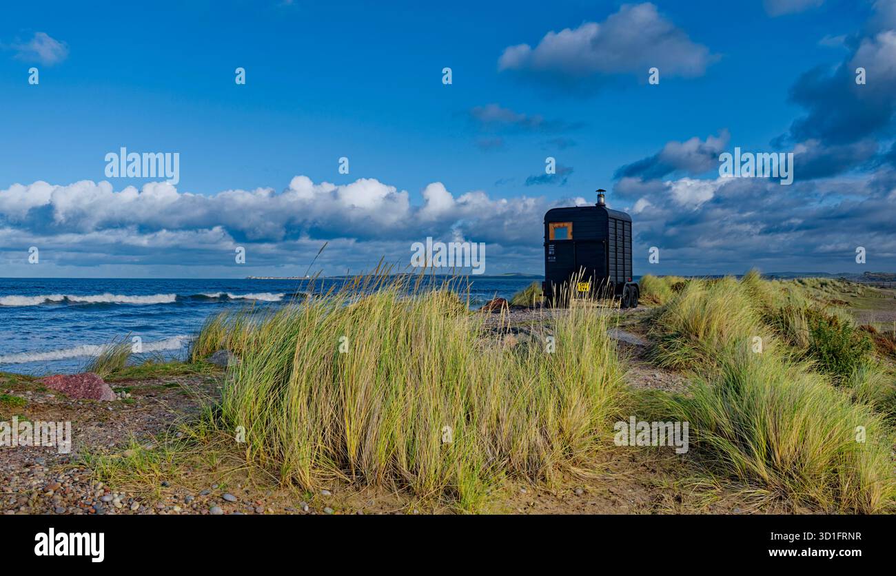 Findhorn Forres Moray Scotland a blue sky sea grasses and the water ...