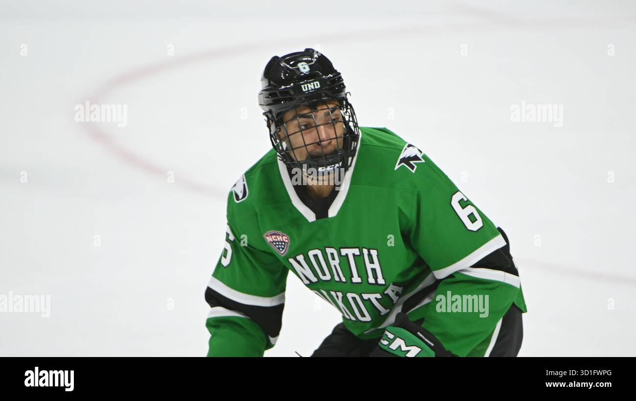 North Dakota defenseman Ej Emery skates to the puck during their game ...