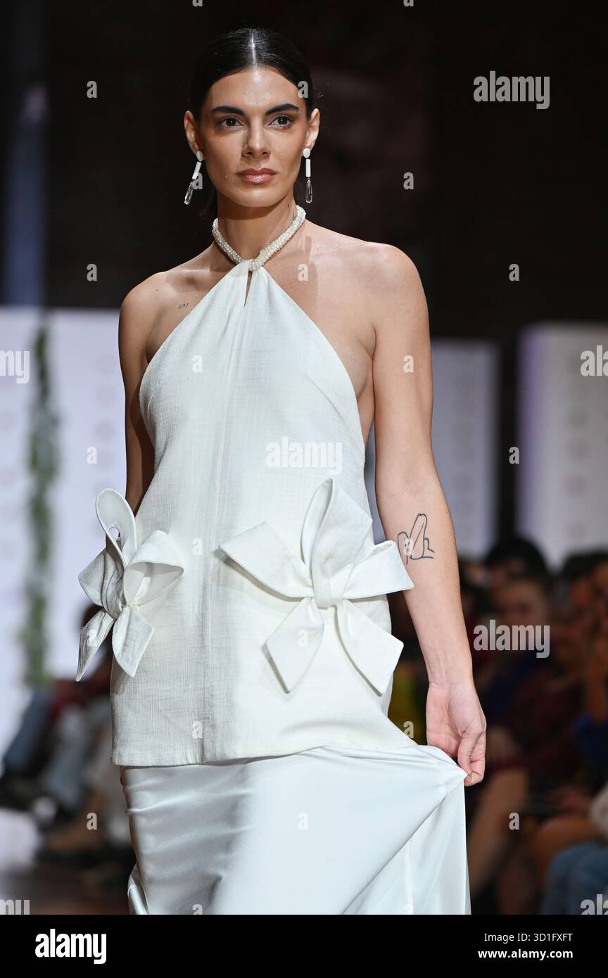 model showcases creations by Candelas Y Felipa during the Atelier ...