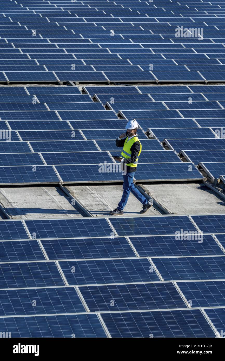 Engineer helmet on blue hi-res stock photography and images - Alamy