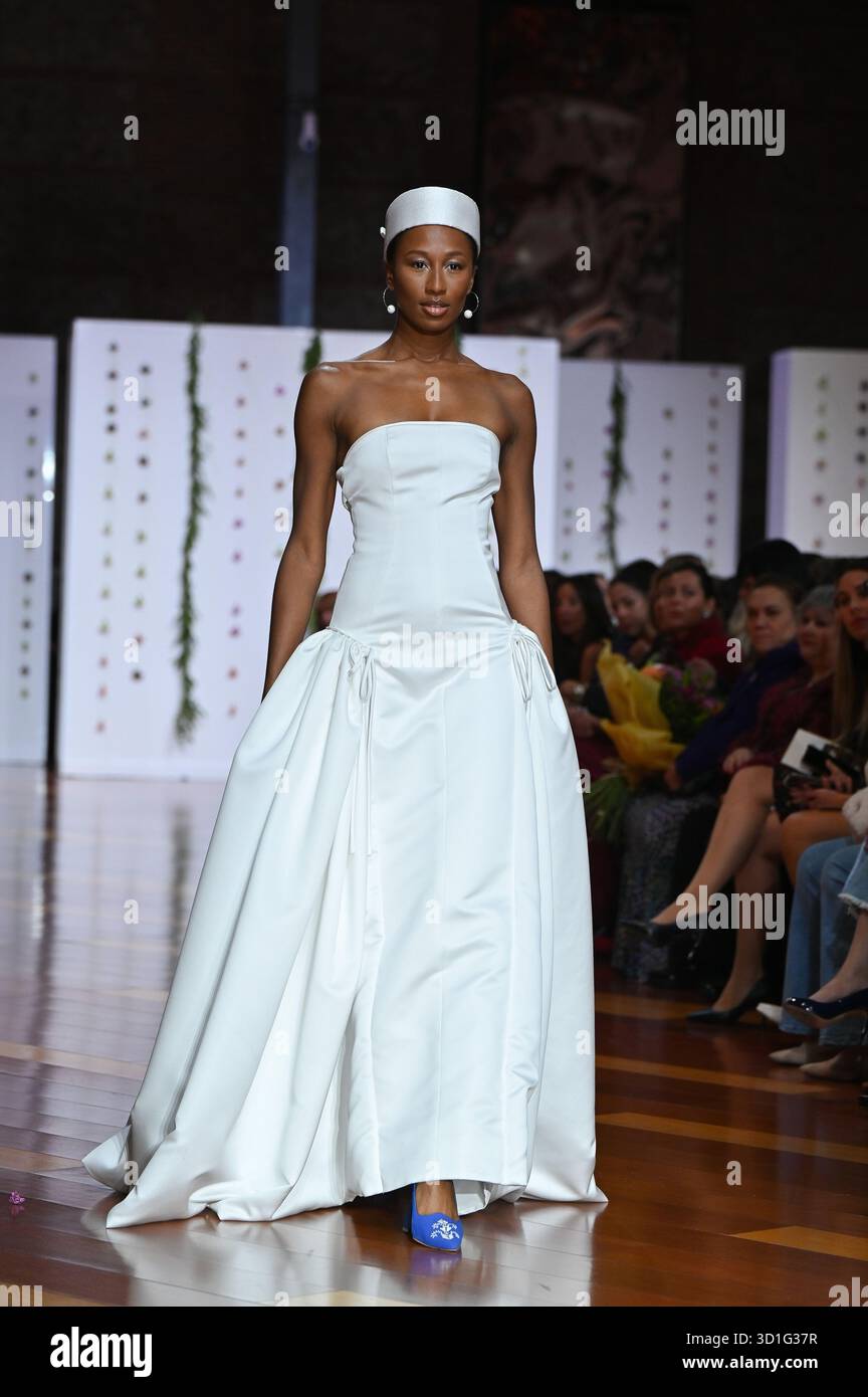 A model showcases creations by Candelas Y Felipa during the Atelier ...