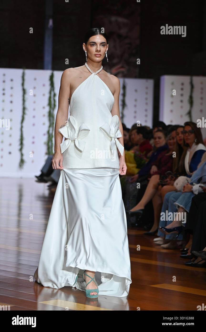 A model showcases creations by Candelas Y Felipa during the Atelier ...
