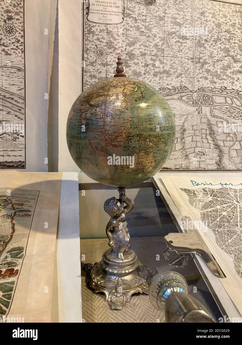 Globes in windows, in Paris, France Stock Photo - Alamy