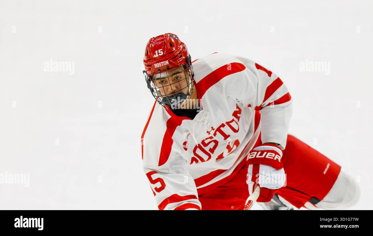 Boston University defenseman Carter Amico (15) shoots during warm-ups ...