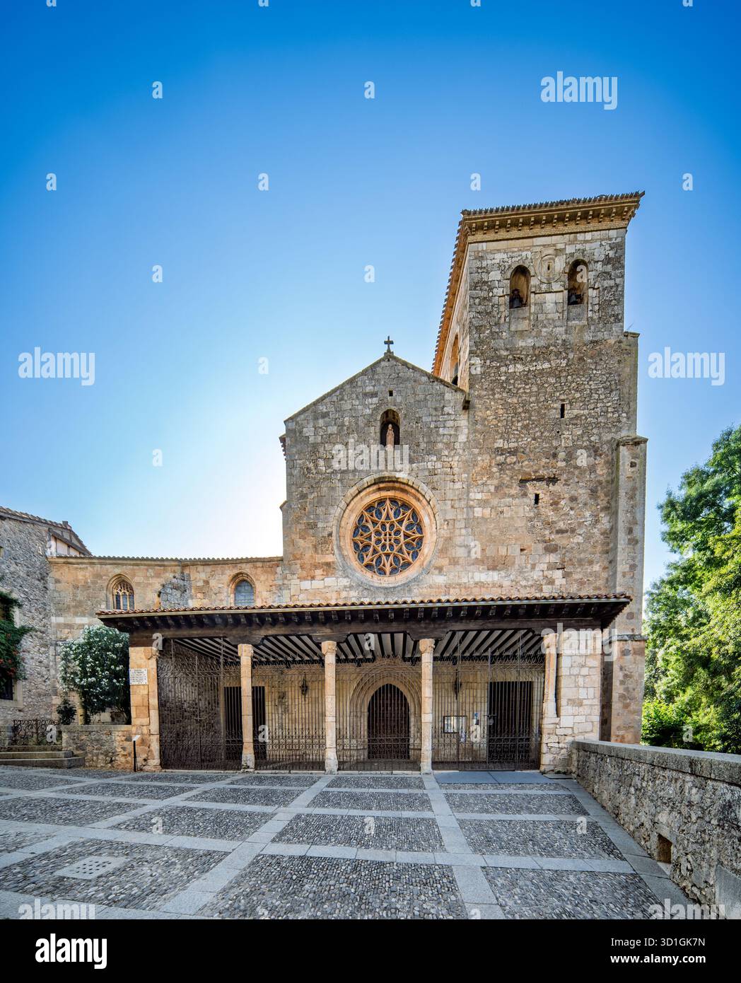 The Collegiate Church of San Cosme y San Damián features a Gothic rose ...