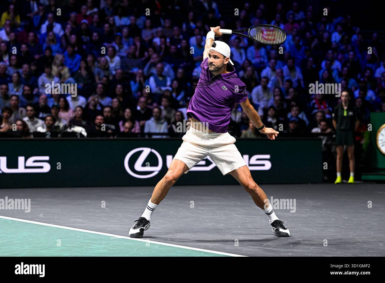 Grigor Dimitrov hits a one-handed backhand during the Rolex Paris ...