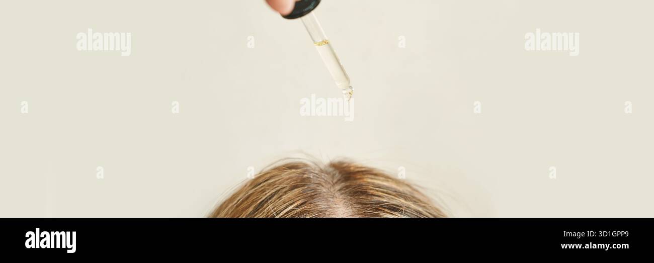 Haircare routine oil dropper hi-res stock photography and images - Alamy