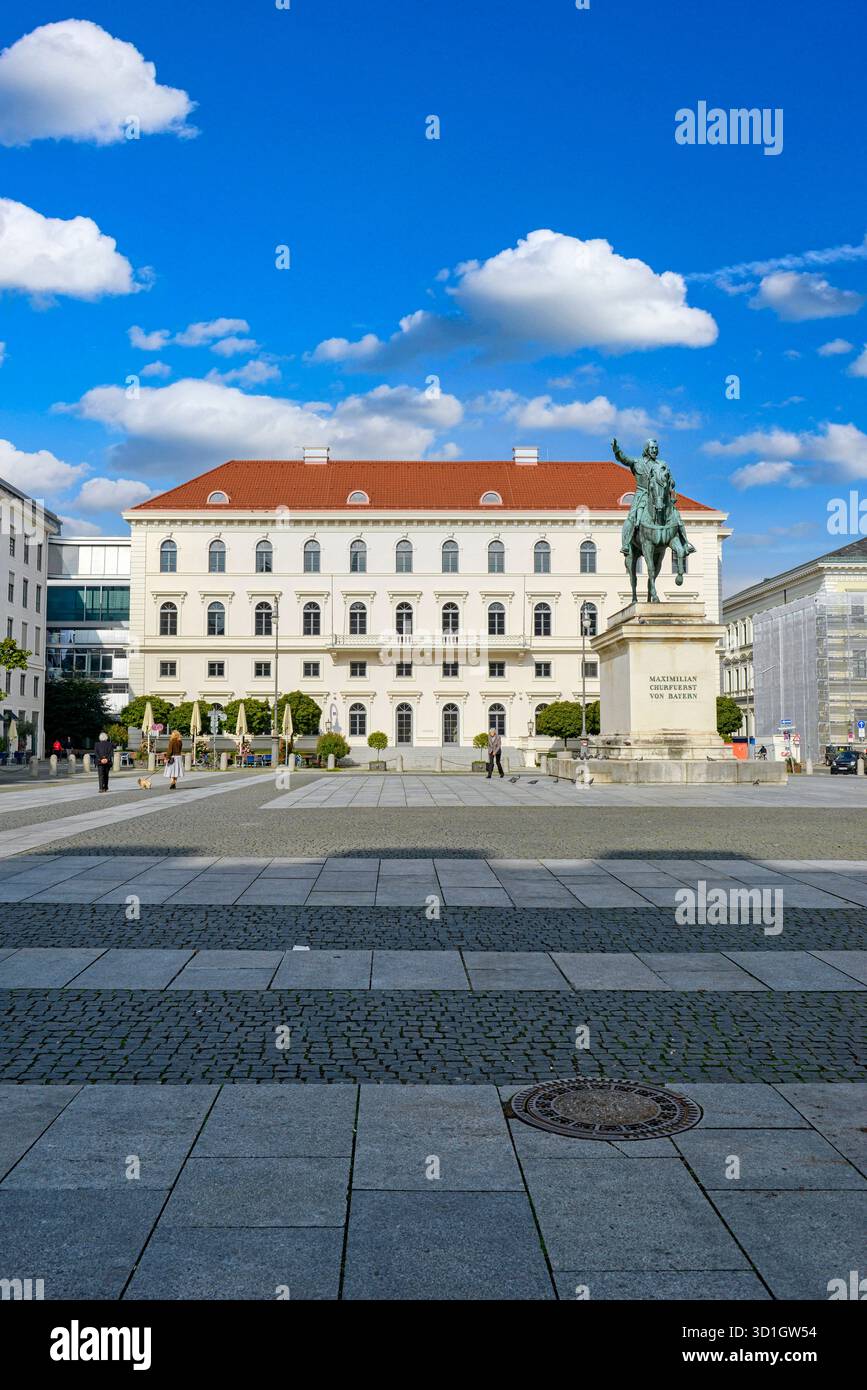 Statue of Maxillian I with the Headquarters of FC Bayern Munchen ...