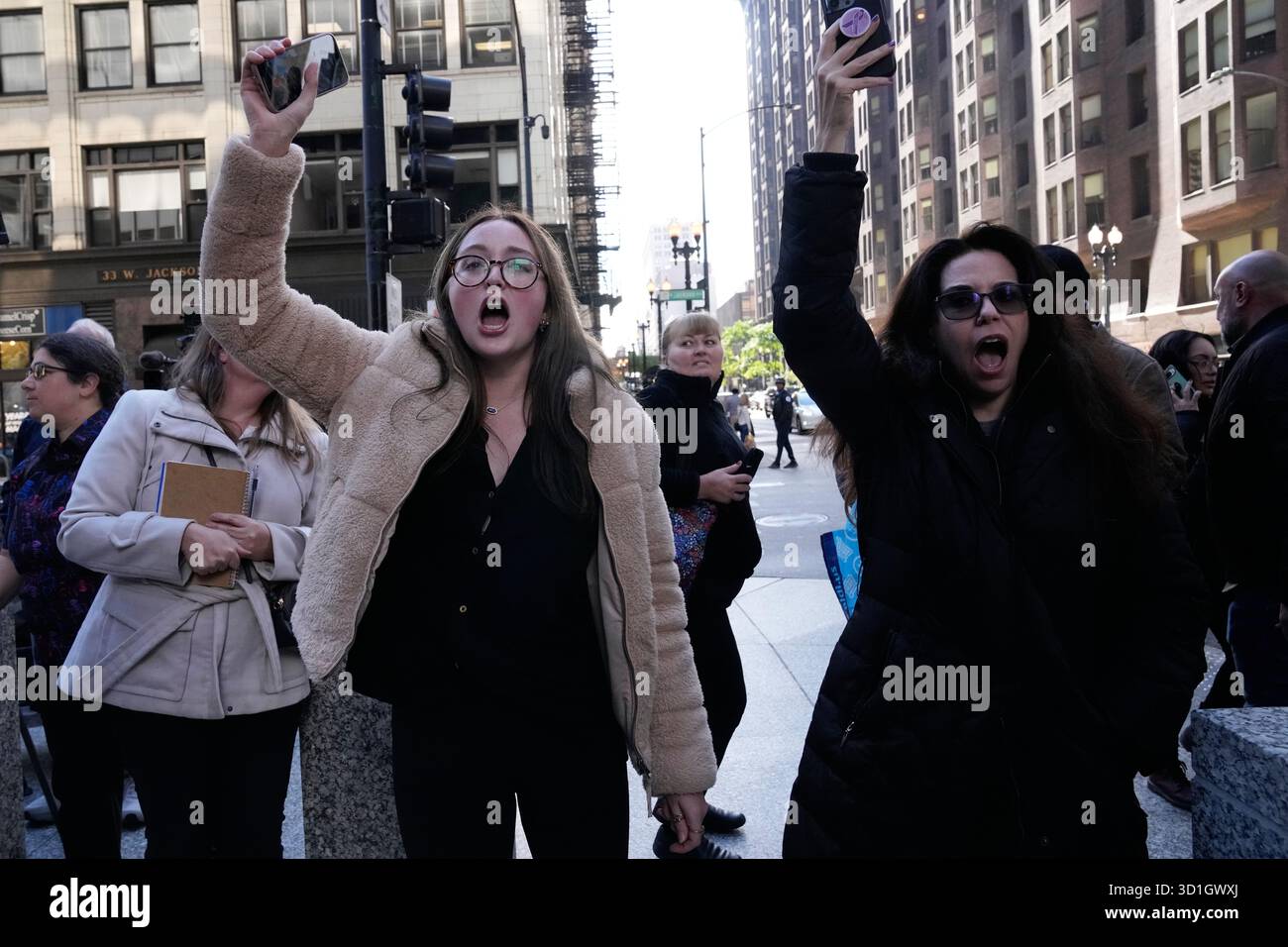 Protesters yell towards U.S. Customs and Border Patrol Gregory Bovino ...