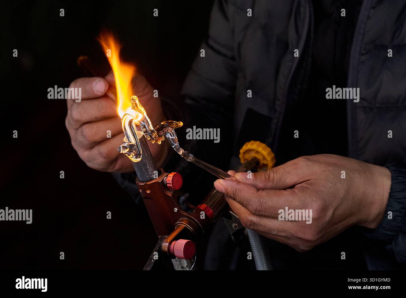 Glass torch with illuminated flame, close-up detail of fire and ...