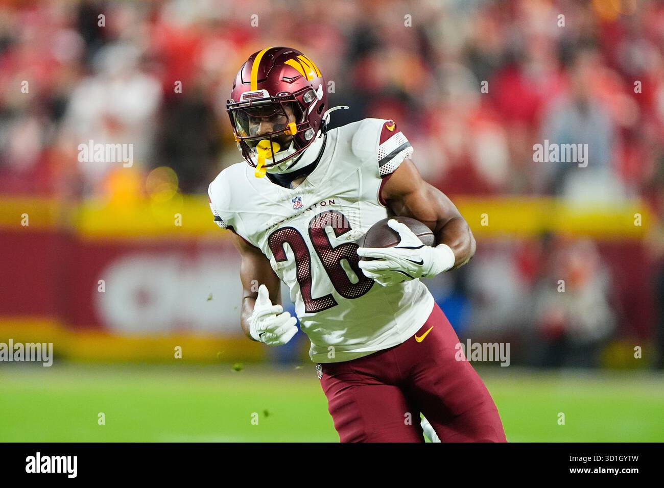Washington Commanders running back Jeremy McNichols runs the ball ...