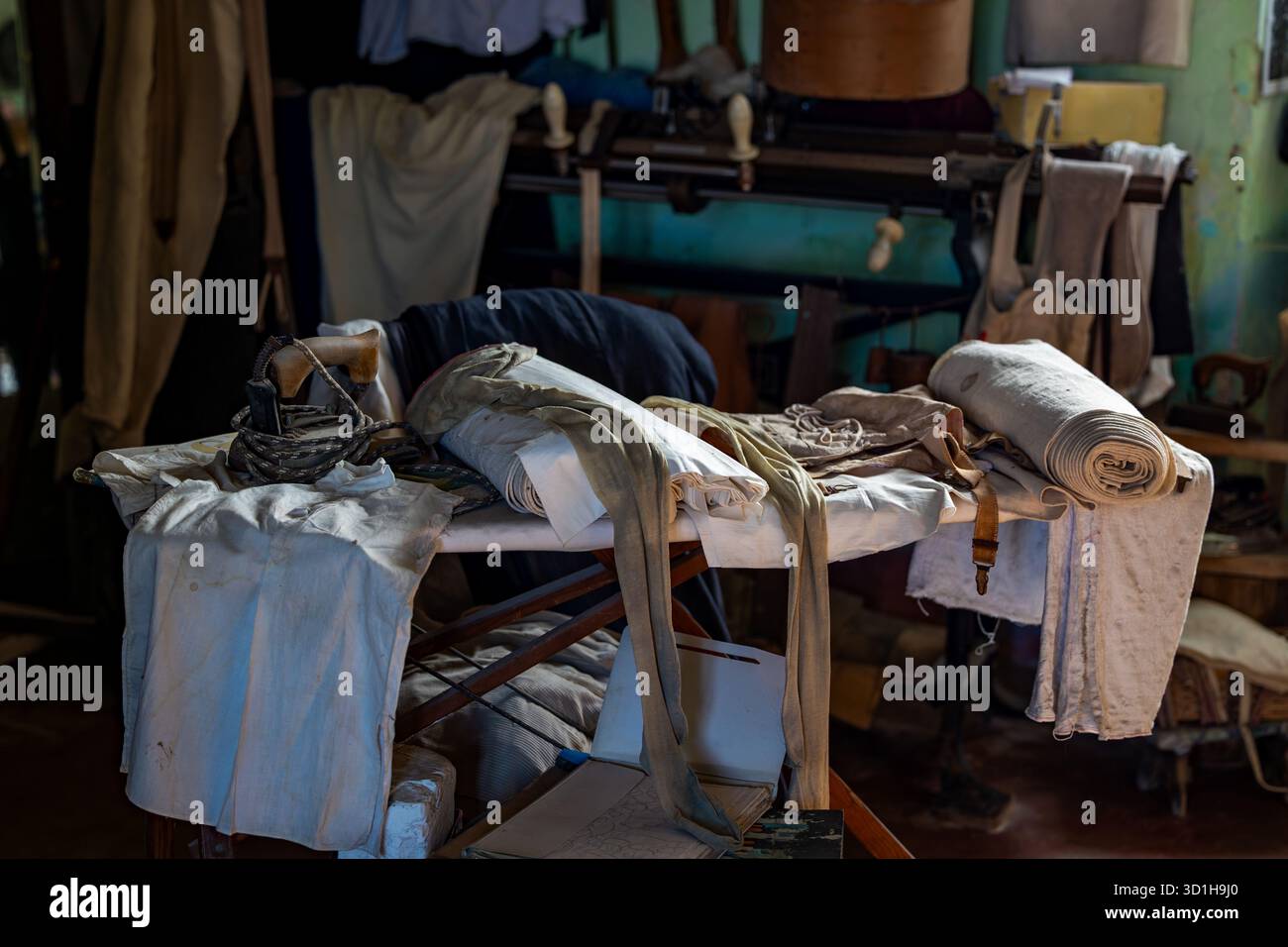 Antique Ironing Board with Vintage Clothes and Old Iron in Traditional ...