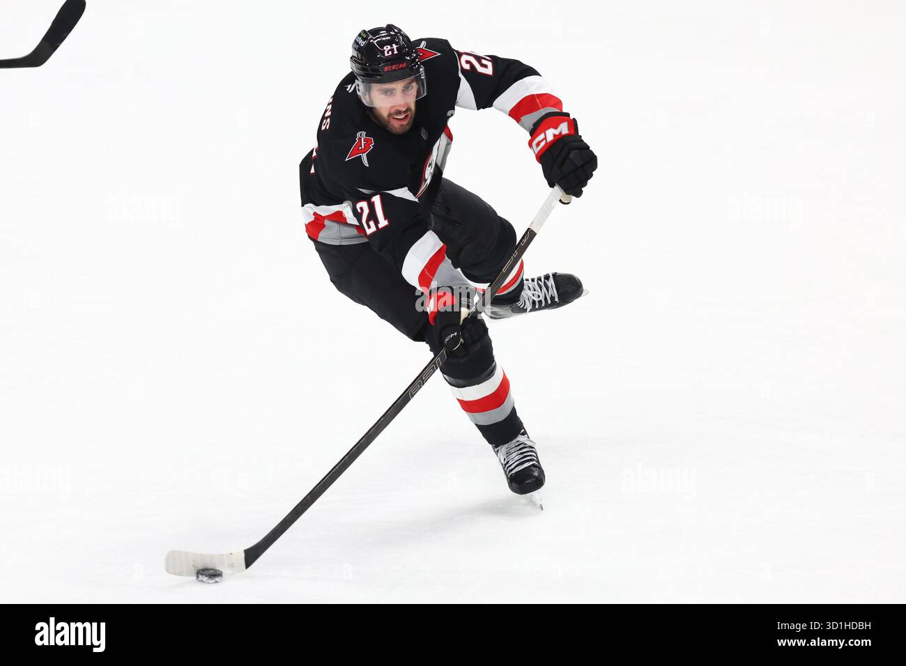 Buffalo Sabres defenseman Conor Timmins (21) carries the puck during ...