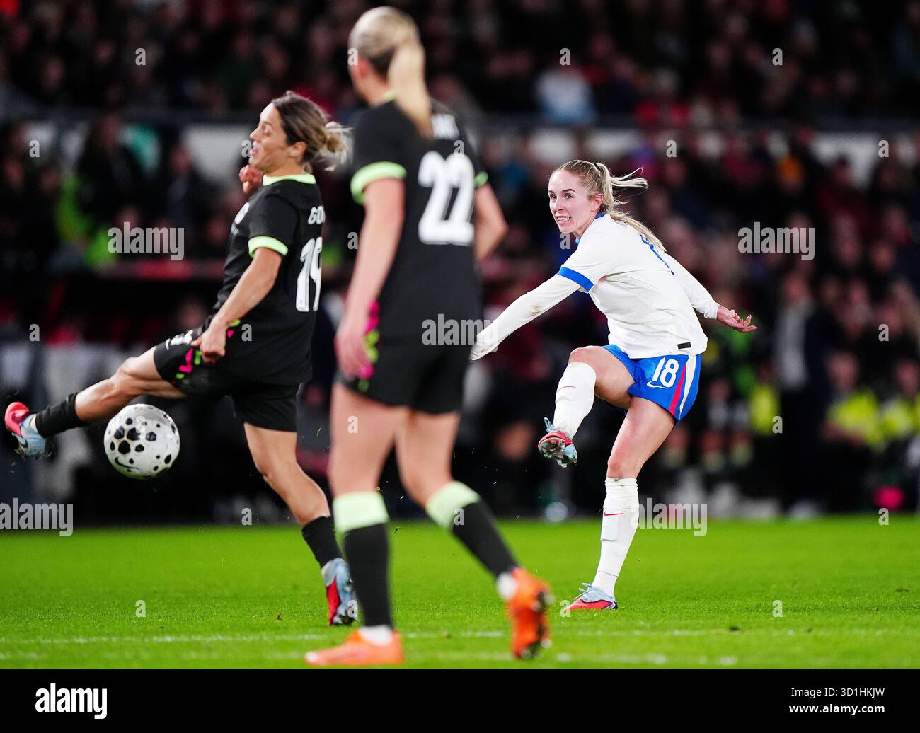 England's Missy Bo Kearns (right) attempts a shot on goal during the ...