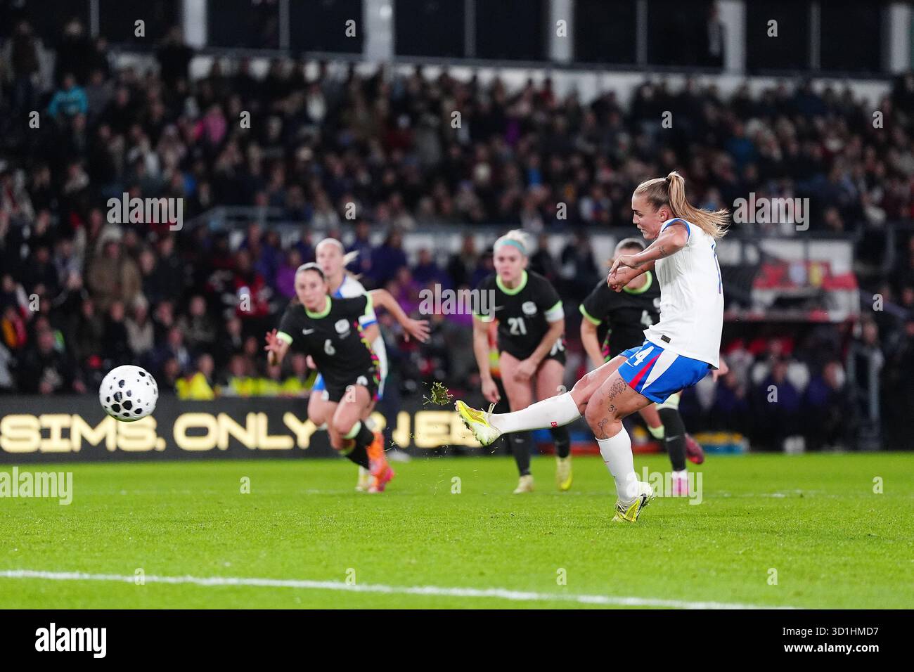 England's Georgia Stanway scores their side's third goal from a penalty ...