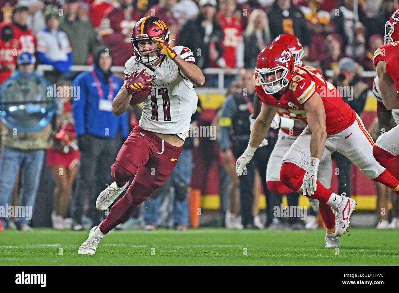 Washington Commanders wide receiver Luke McCaffrey (11) returns a kick ...