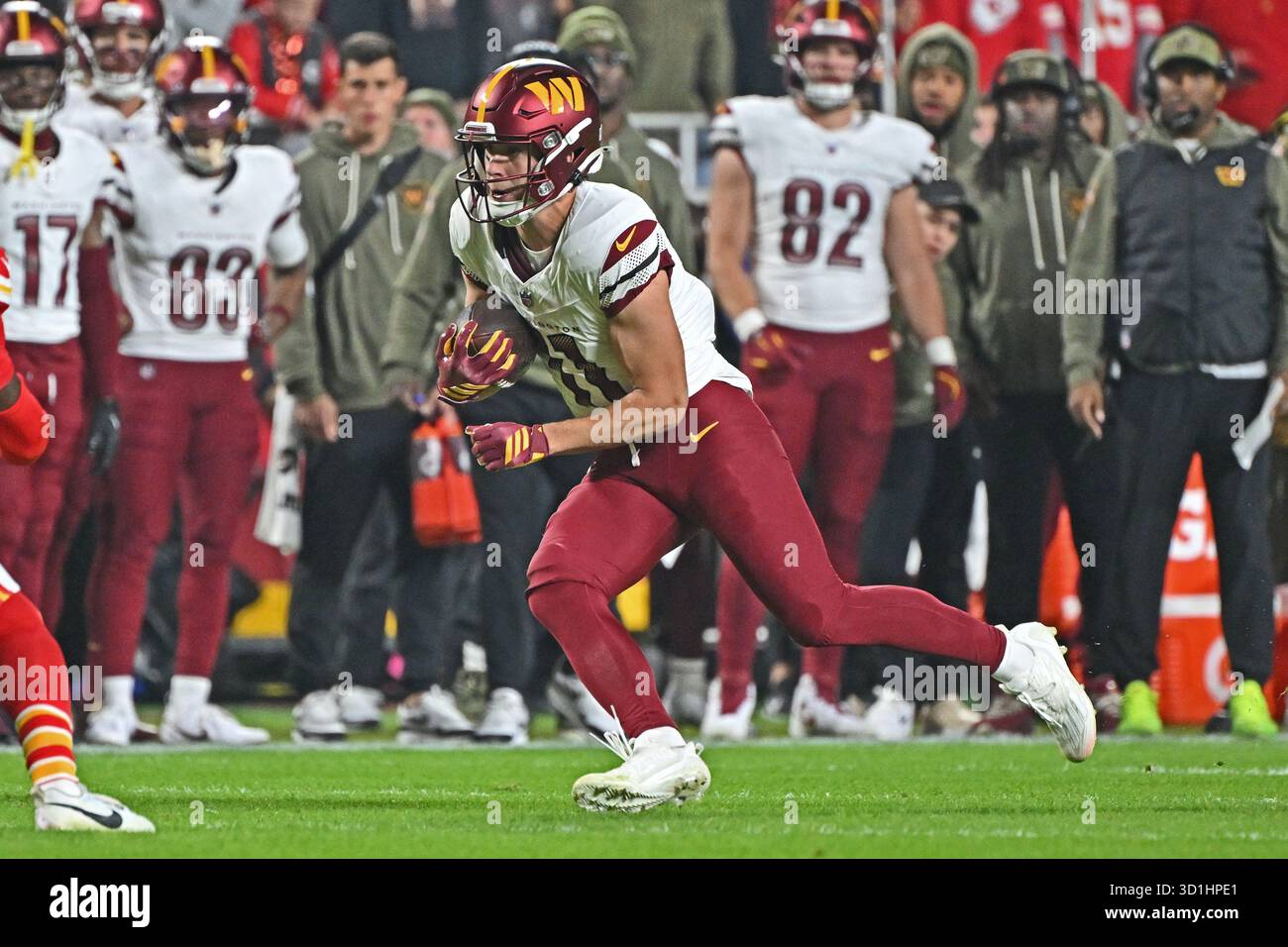 Washington Commanders wide receiver Luke McCaffrey (11) runs after ...