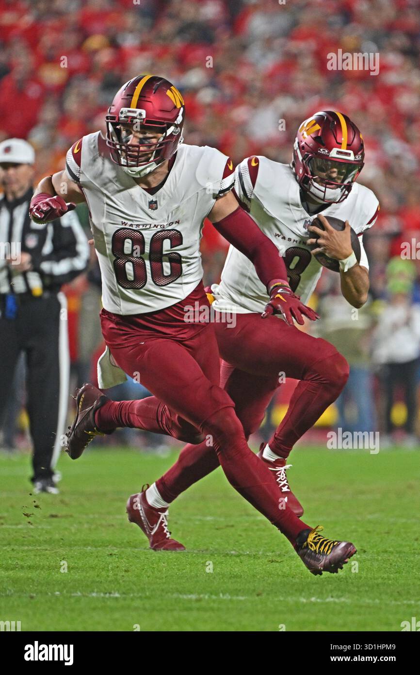 Washington Commanders tight end Zach Ertz (86) lead blocks for ...