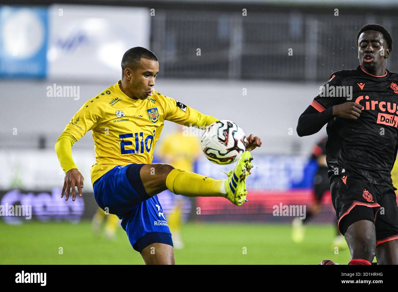 Beveren's Kurt Abrahams and Standard's Hakim Sahabo pictured in action ...