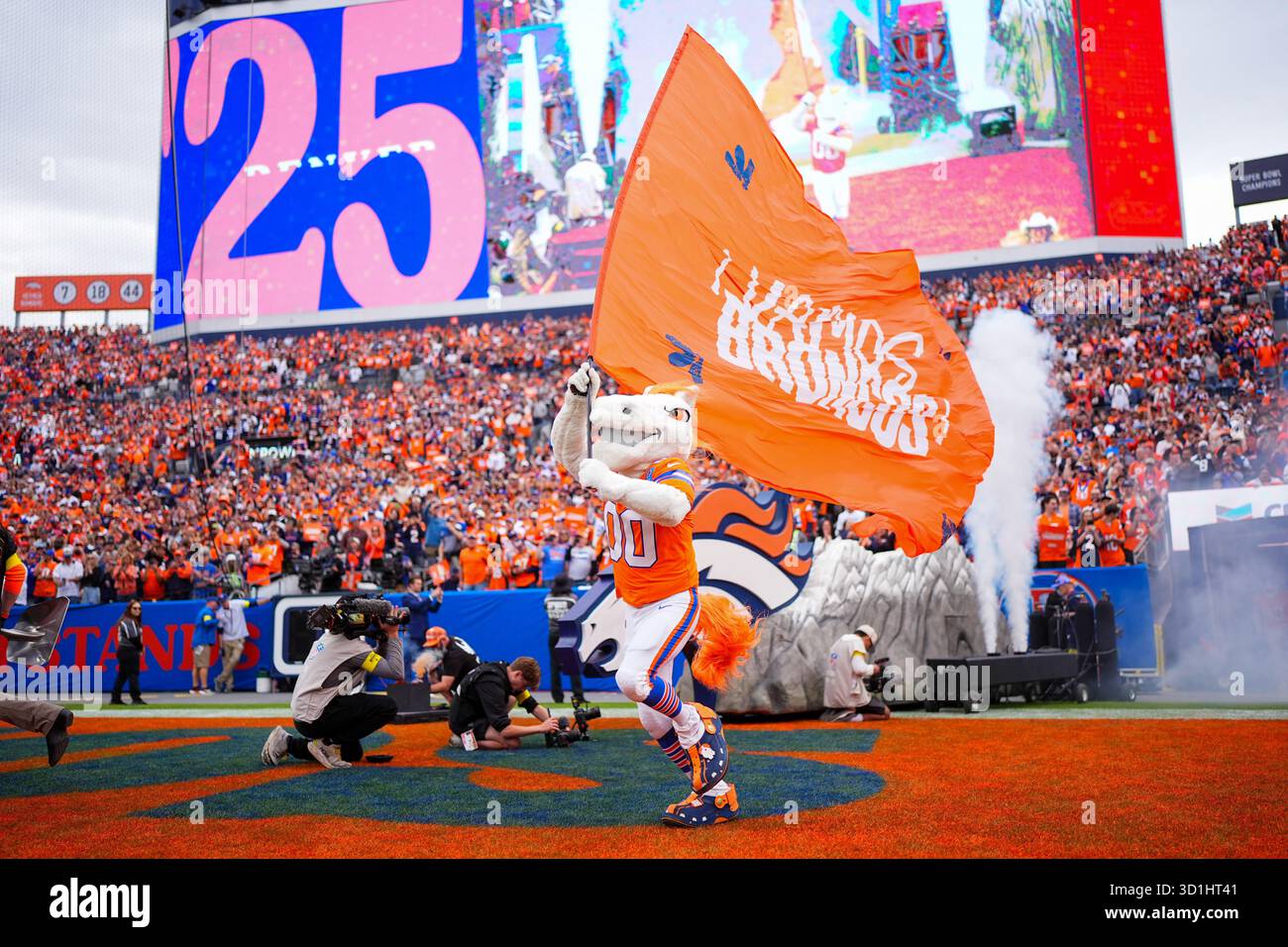 Miles the Denver Broncos mascot takes the field for player ...