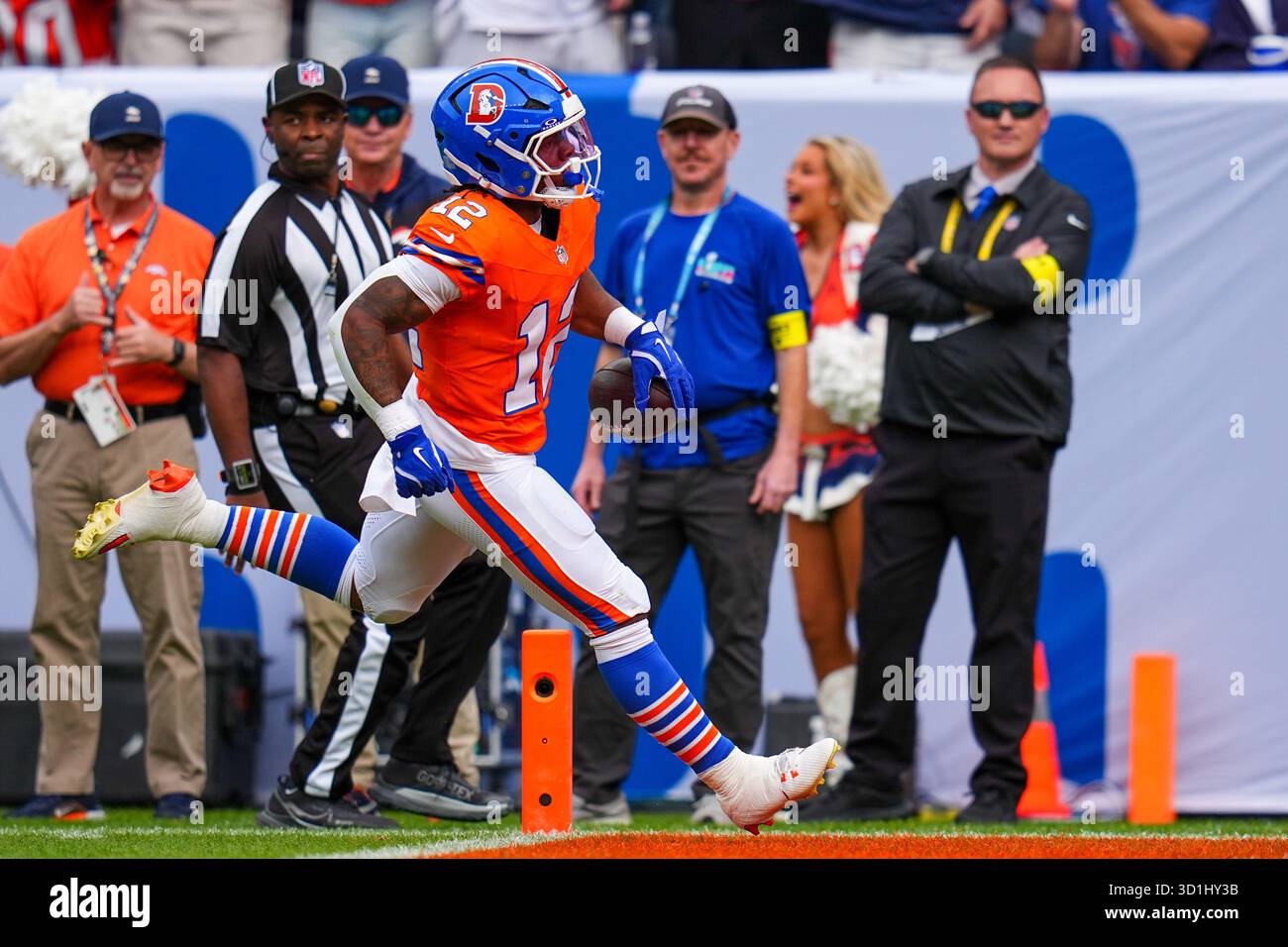 Denver Broncos running back RJ Harvey runs for a touchdown against the ...