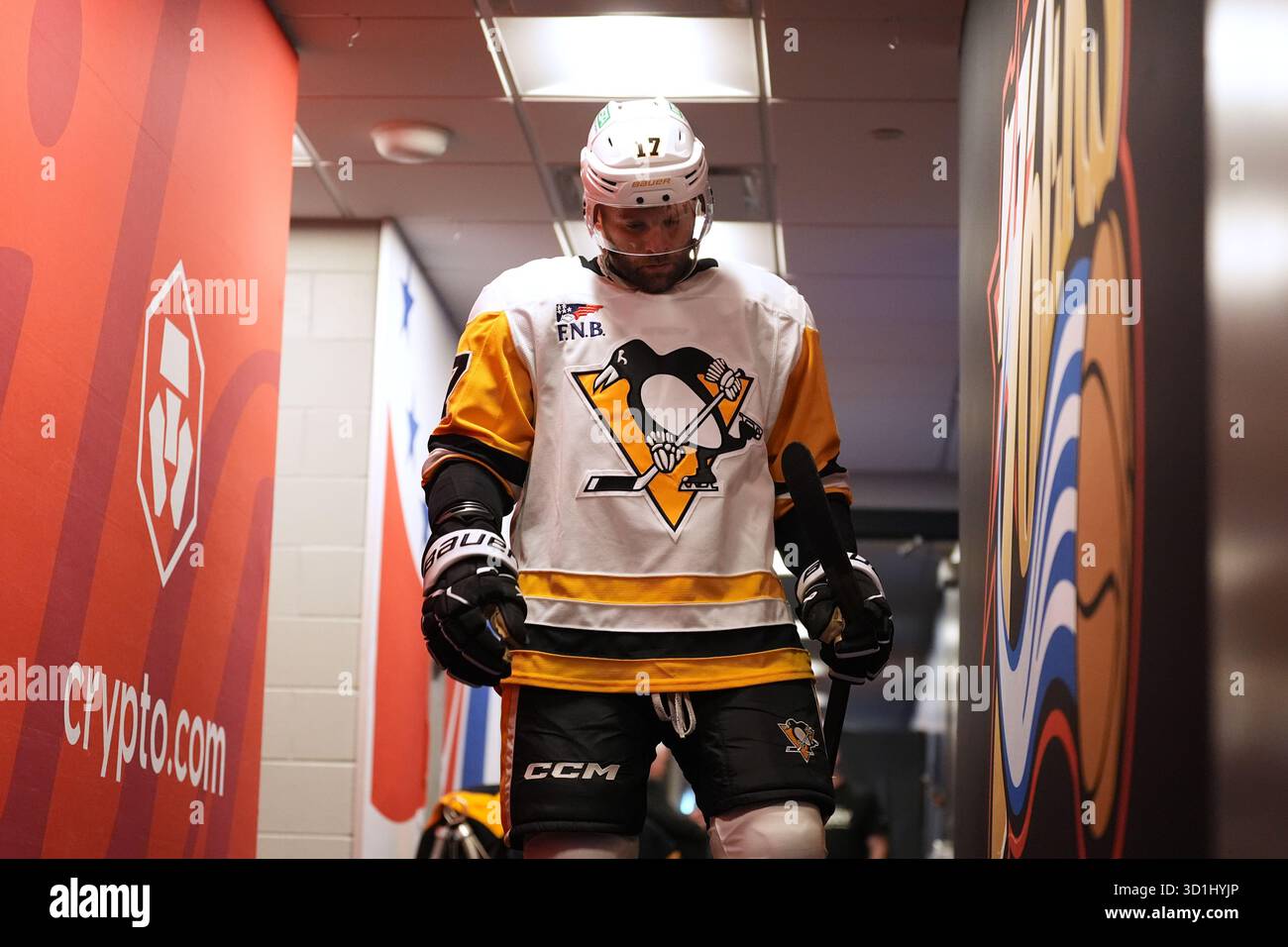 Pittsburgh Penguins' Bryan Rust walks to the ice before an NHL hockey ...