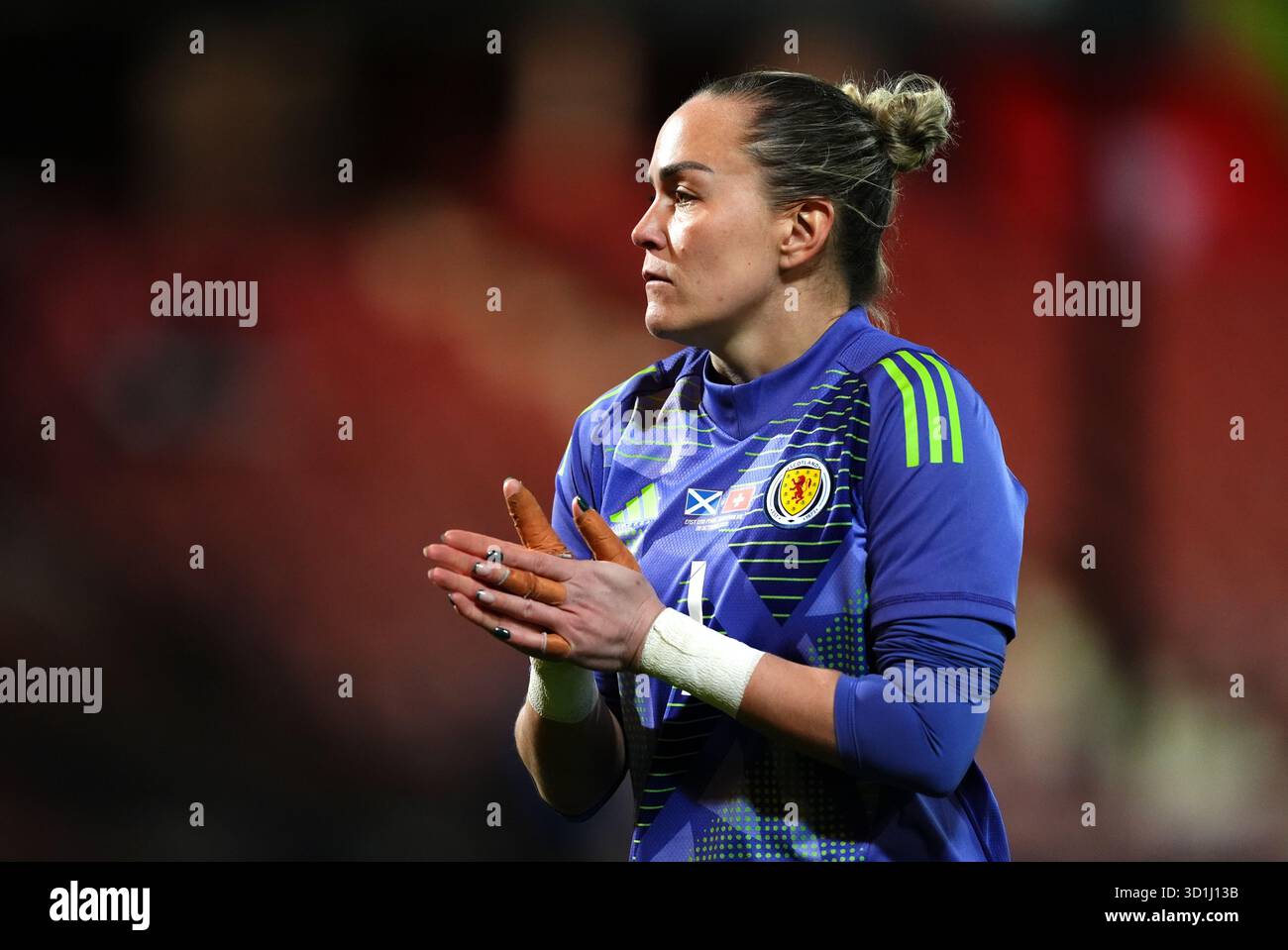 Scotland goalkeeper Lee Gibson applauds the fans following the ...