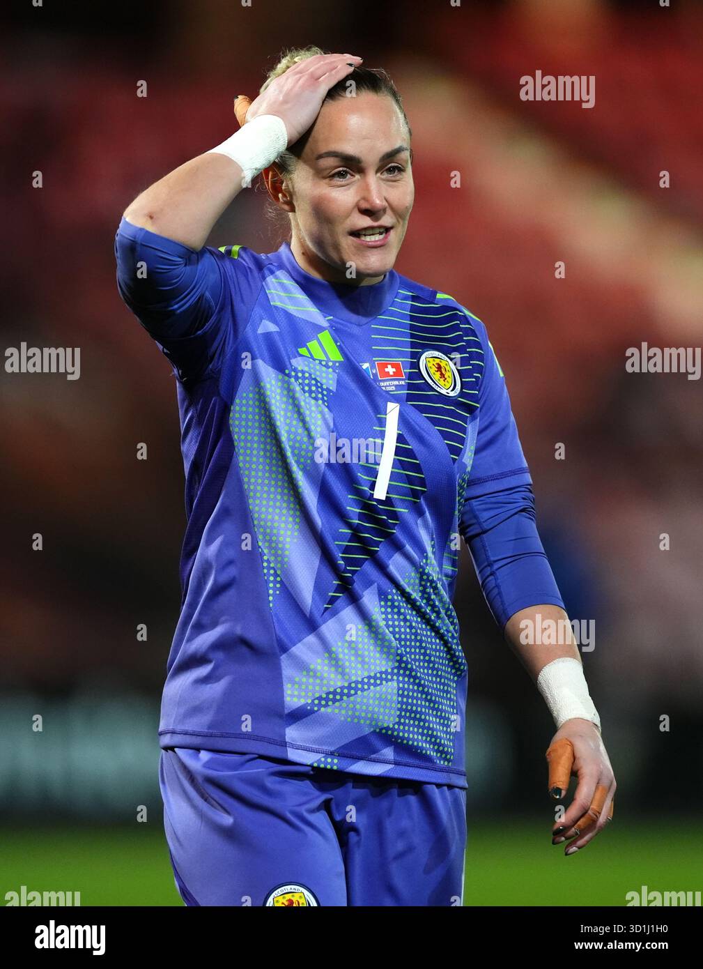 Scotland goalkeeper Lee Gibson reacts following the international ...