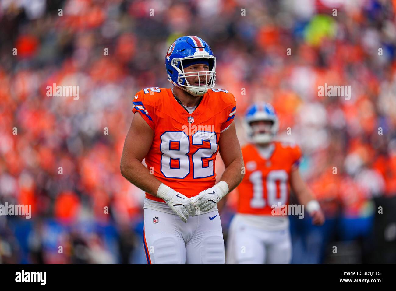 Denver Broncos tight end Adam Trautman (82) reacts to a call against ...