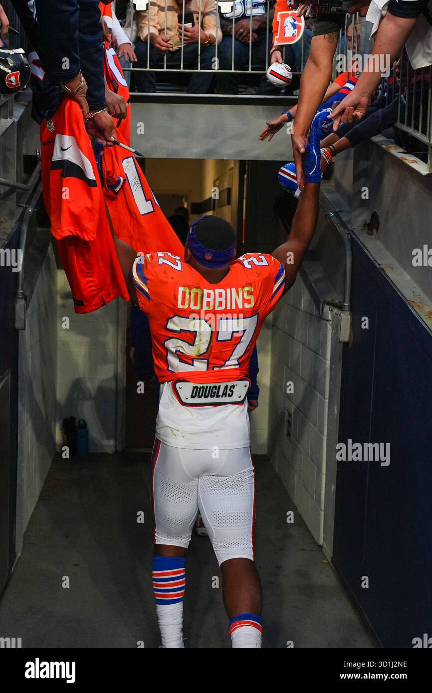 Denver Broncos running back J.K. Dobbins leaves the field after a win ...
