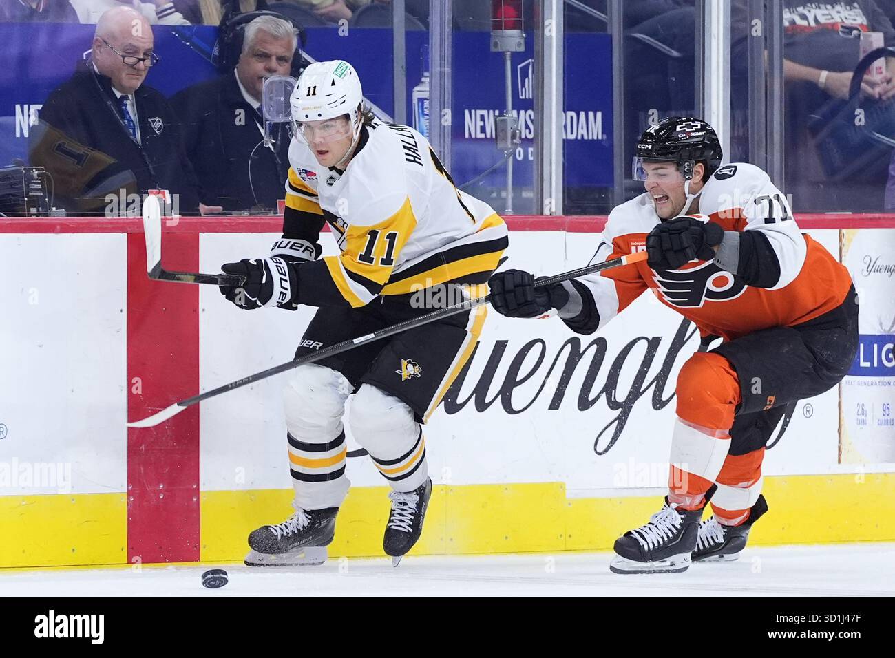 Pittsburgh Penguins' Filip Hallander, left, and Philadelphia Flyers ...