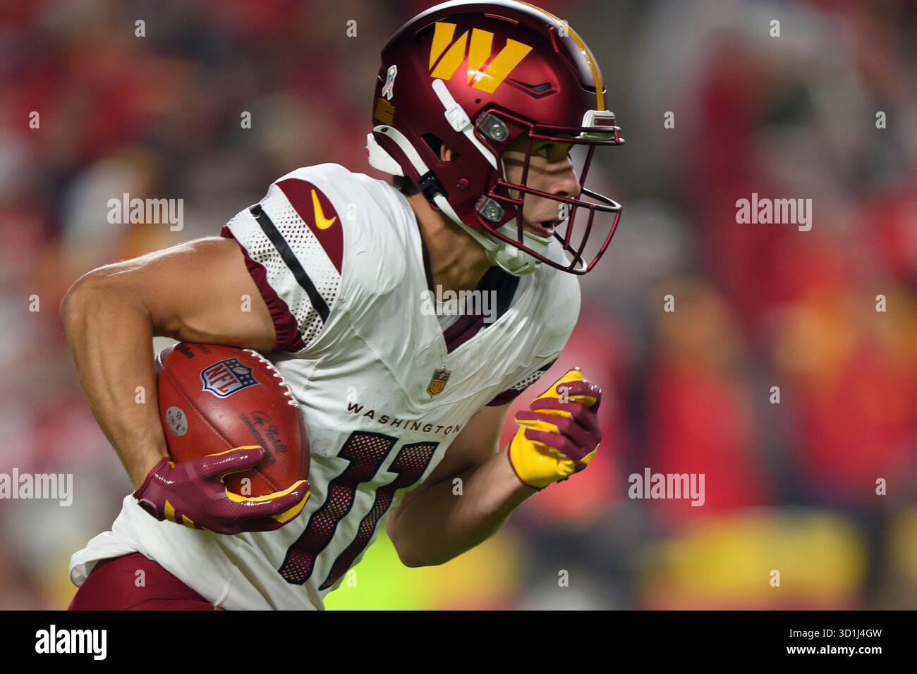 Washington Commanders wide receiver Luke McCaffrey runs back the ...