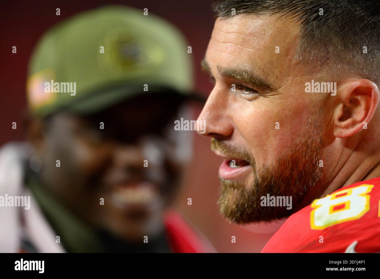 Kansas City Chiefs tight end Travis Kelce talks to teammates during the ...