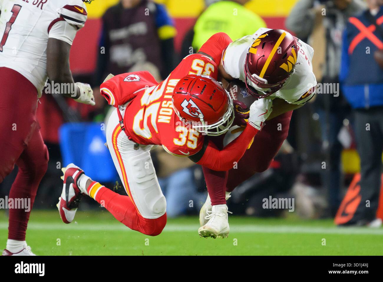 Kansas City Chiefs cornerback Jaylen Watson (35) tackles Washington ...