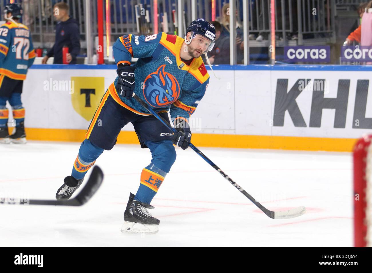 Pavel Akolzin (18) of Shanghai Dragons Hockey Club seen in action ...