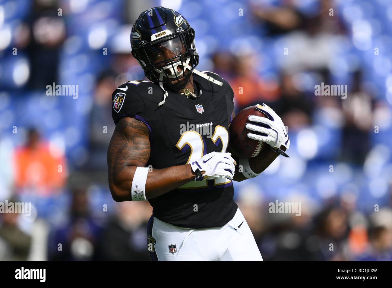 Baltimore Ravens running back Derrick Henry (22) warms up before an NFL ...