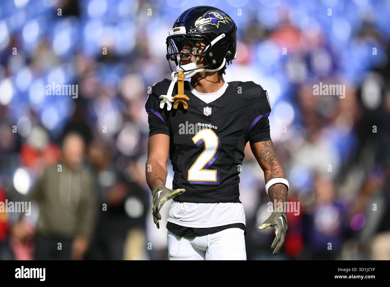Baltimore Ravens cornerback Nate Wiggins (2) warms up before an NFL ...