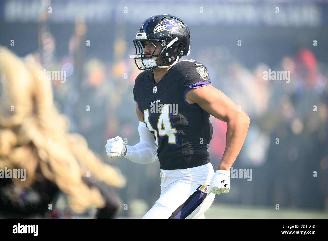 Baltimore Ravens safety Kyle Hamilton (14) takes to the field before an ...